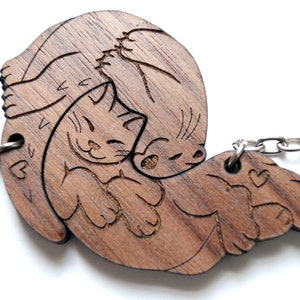 Interlocking Cat and Otter Couple Keychains - Friendship or ...