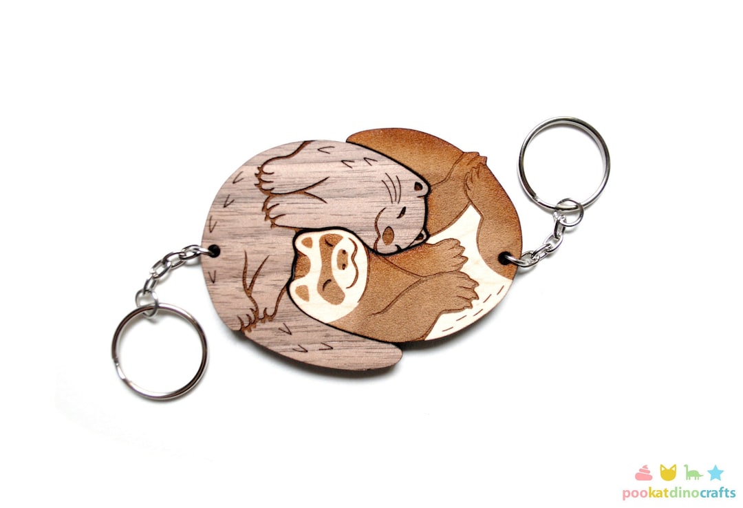 Interlocking Otter and Ferret Keychains - Friendship or Relationship ...