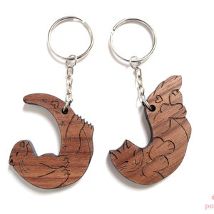 Interlocking Cat and Otter Couple Keychains - Friendship or ...
