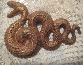 Coiled serpent | Etsy