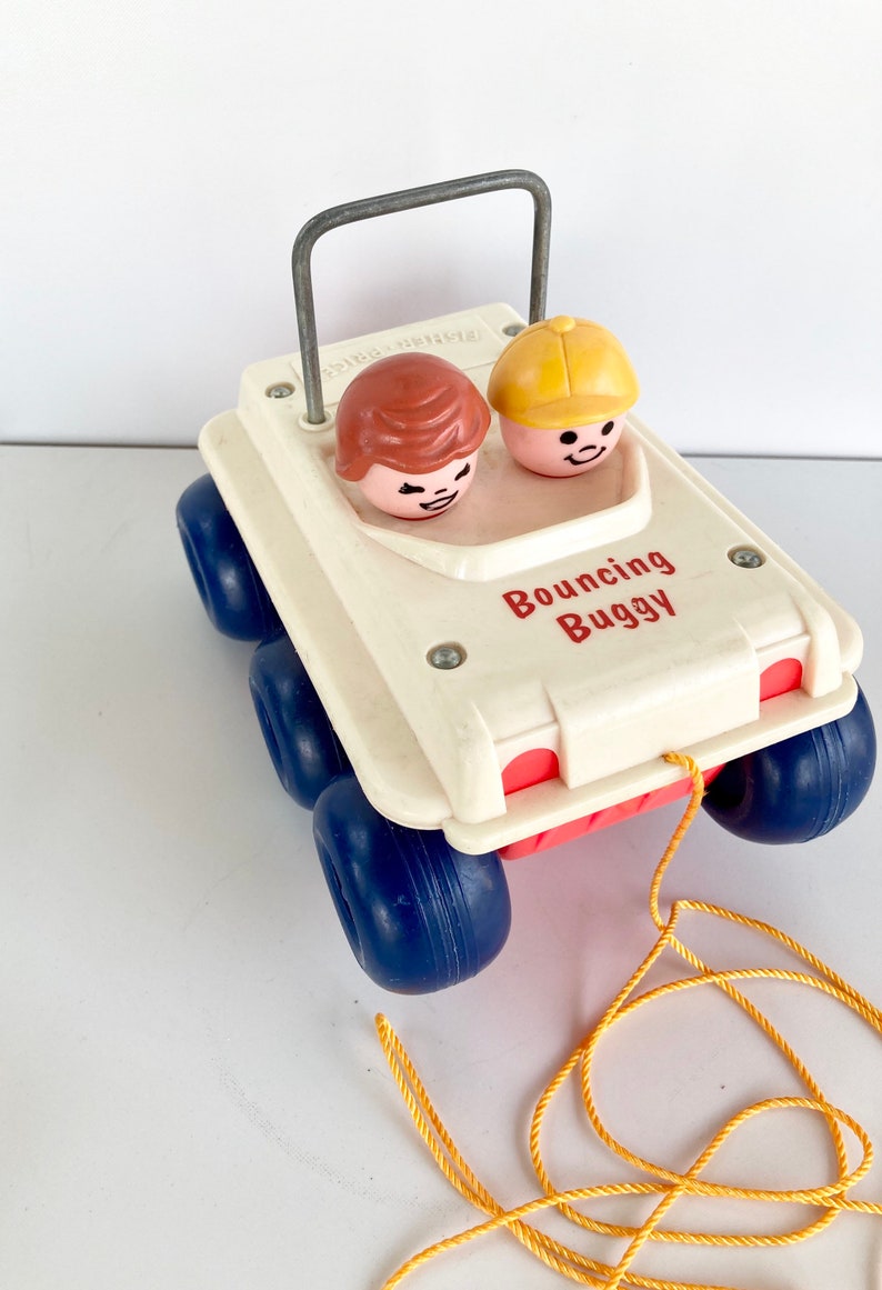 Fisher Price Vintage Bouncing Buggy Pull Toy - Etsy
