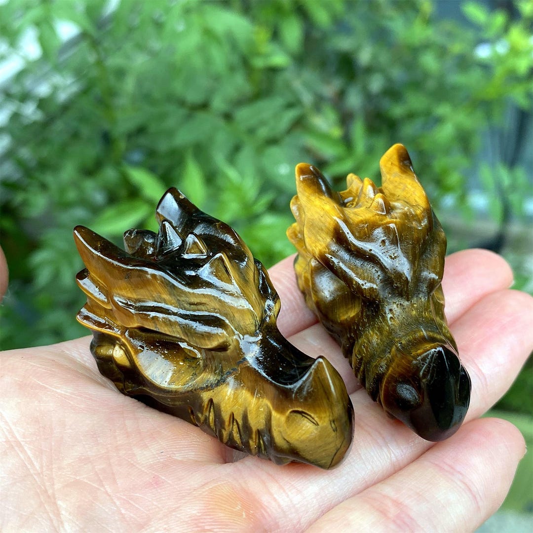 Cráneo de dragón de jade y ojo de tigre: animal de cristal tallado a ...