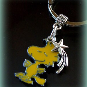 Unique Yellow Bird - WOODSTOCK Looking Bird Keychain Jewelry - Star ...