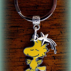 Unique Yellow Bird - WOODSTOCK Looking Bird Keychain Jewelry - Star ...