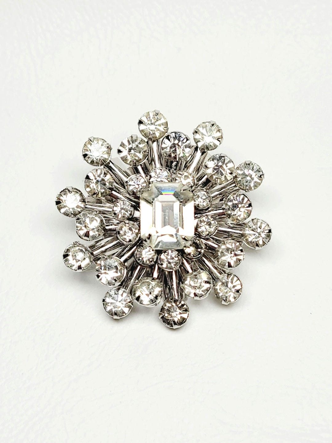 Vintage Rhinestone Starburst Brooch: Tiered, Round and Emerald Cut ...