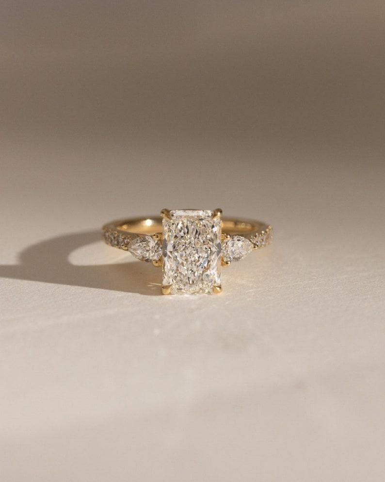 Radiant Cut Moissanite Engagement Ring: Pear Side Stones, D Color, VVS1 ...
