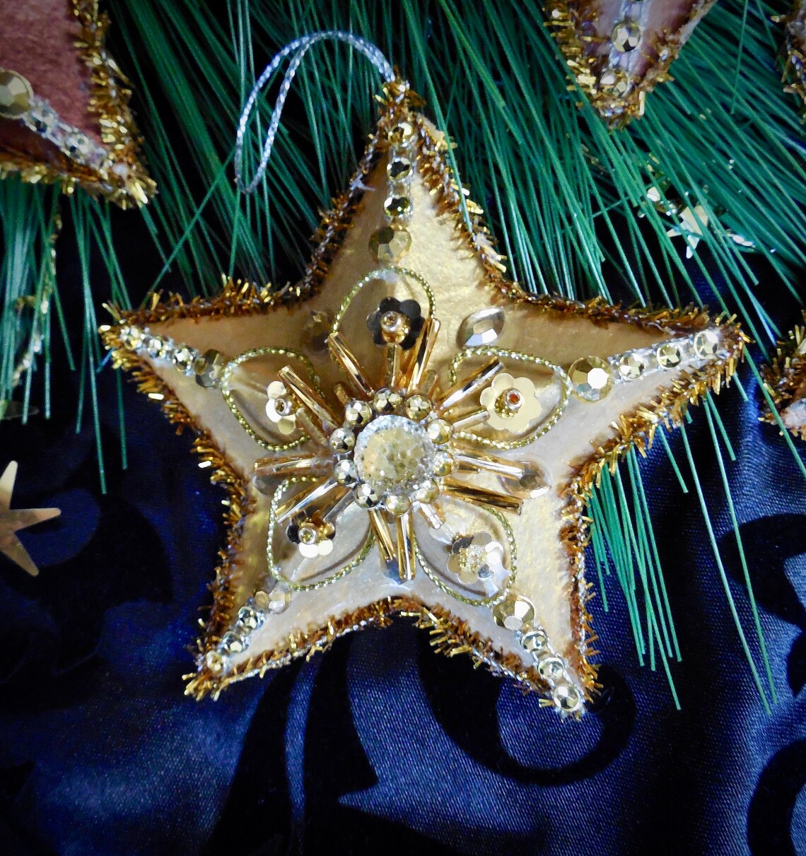Set of Four Renaissance Bejeweled Star Ornaments in Precious Metal Hues ...