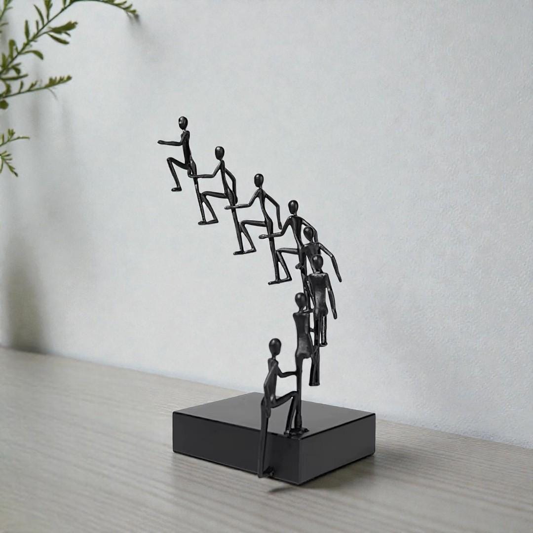 Inspirational Metal Sculpture of Teamwork | Social Support Sculpture ...