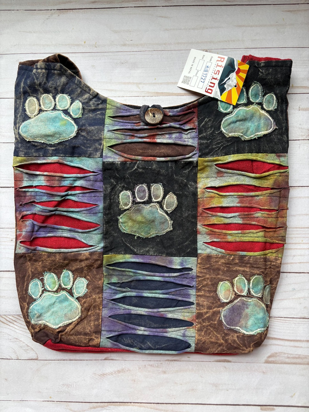 Rising International Crossbody Paw Print Nepal Hobo Multi-colored Bag ...