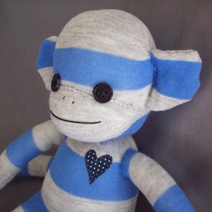 A Sock Monkey in Blue and Grey Stripes Pierce - Etsy