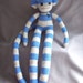 A Sock Monkey in Blue and Grey Stripes Pierce - Etsy