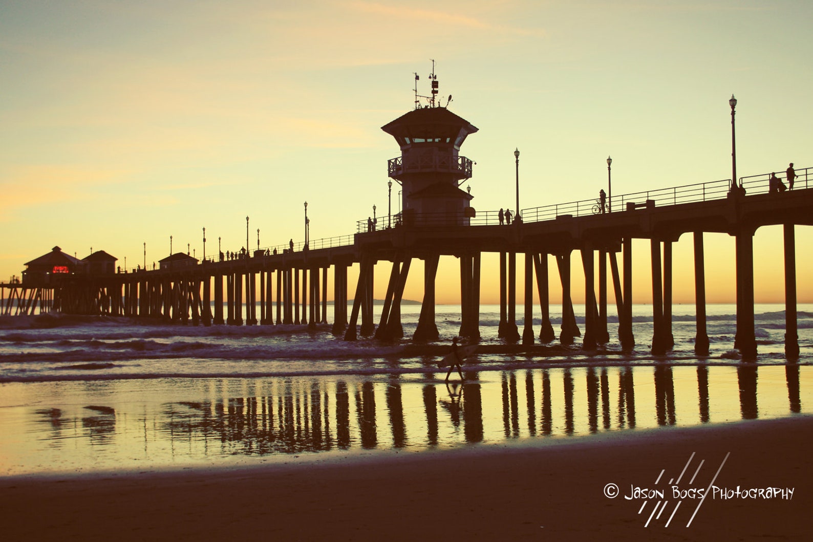 California Summer Sunset - Surfer Walking Under the HB Pier as the Sun ...