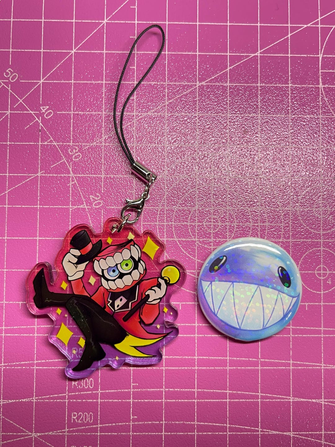 TADC Caine Acrylic Phone Charm & Bubble Glitter Holographic Button ...