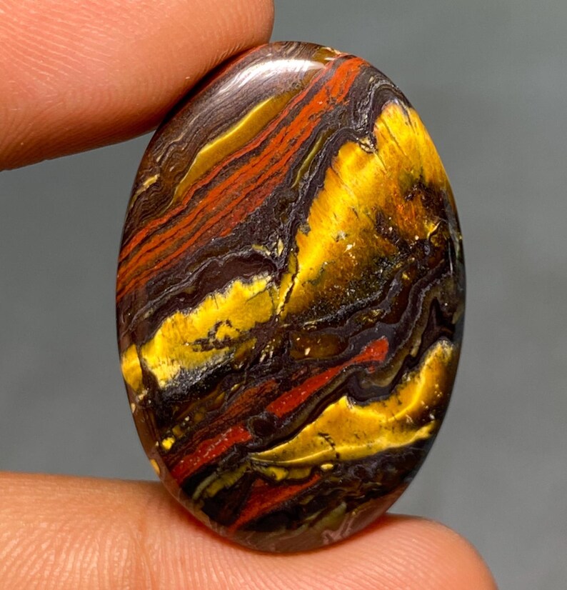 Iron Tiger Eye/oeil De Fer Cabochon 35x23x4 Mm Tiger Iron is a ...