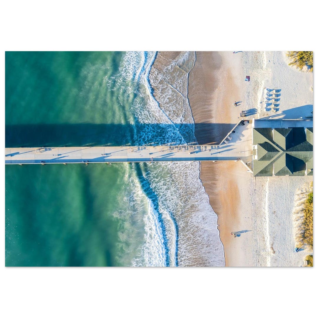 Aluminum Print, Aerial View of a Coastal Pier as Waves Roll Onto Shore ...