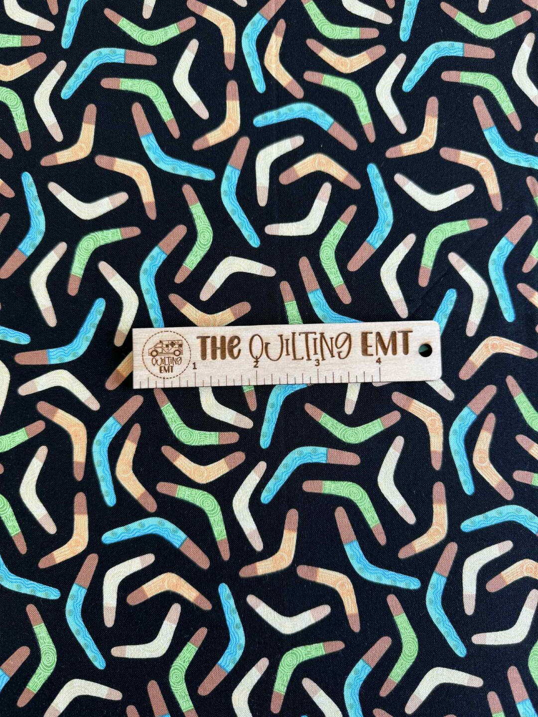 Blue, Green and Brown Boomerangs on a Black Background Cotton Fabric ...