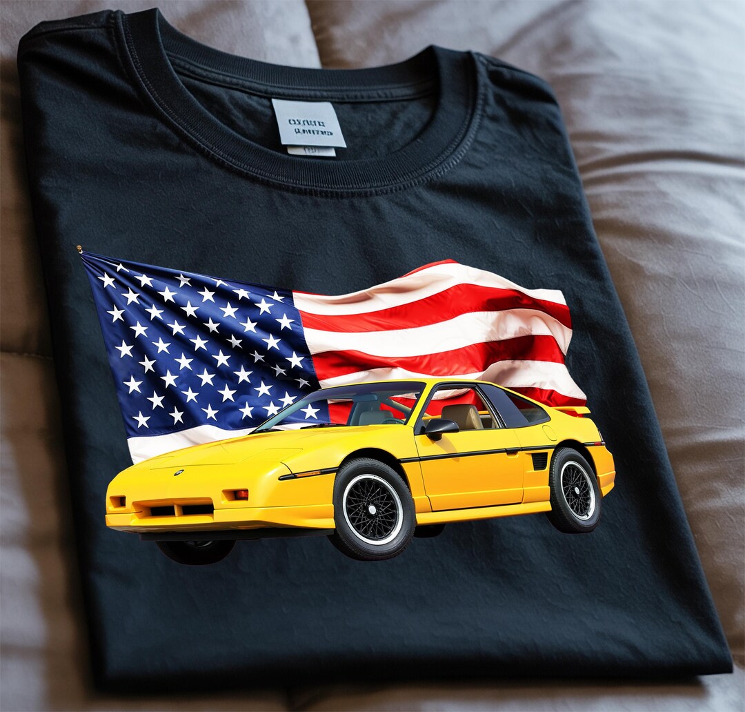 A Bright Yellow Fiero GT in Front of the Stars & Stripes. T-shirt, USA ...