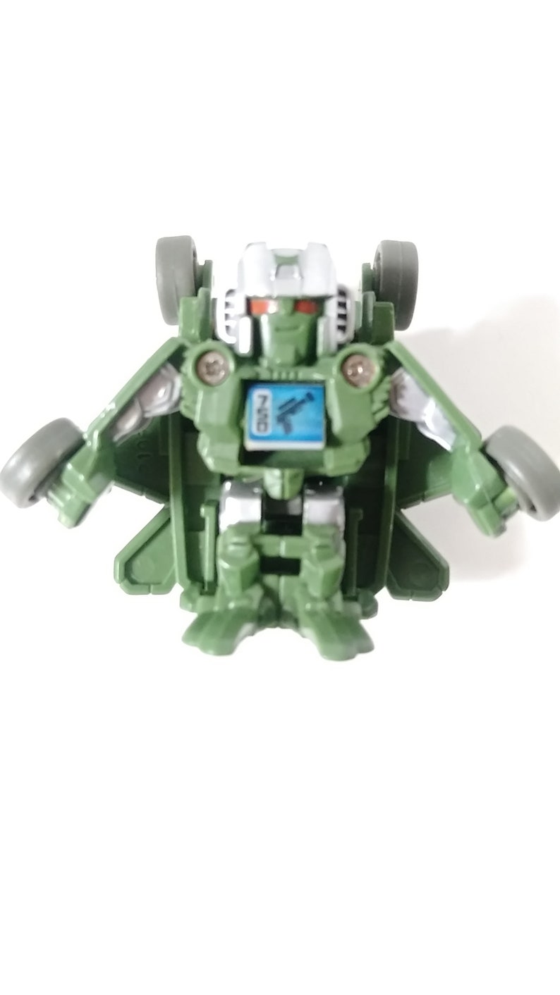 Hasbro Mini Bot Transformer Green Jet Airplane to Robot Tomy | Etsy