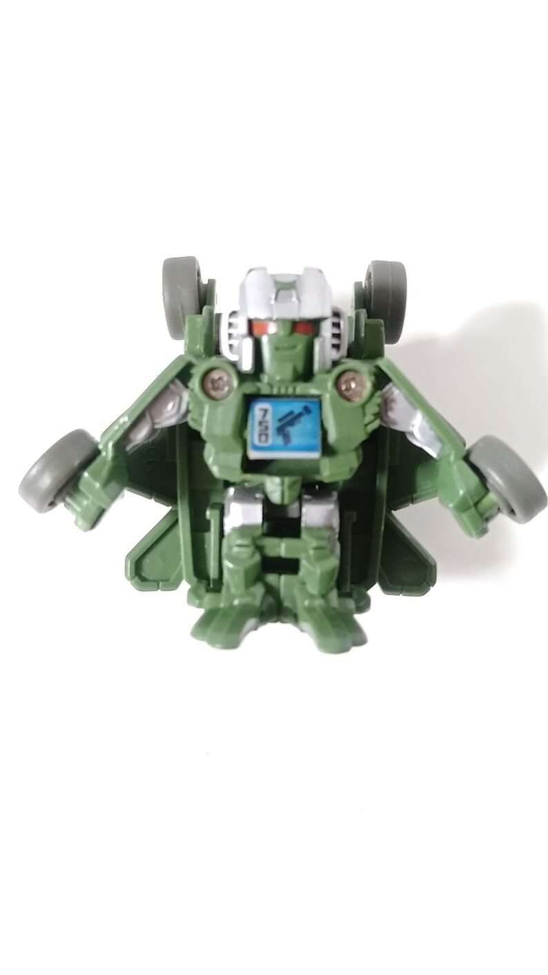 Hasbro Mini Bot Transformer Green Jet Airplane to Robot Tomy | Etsy