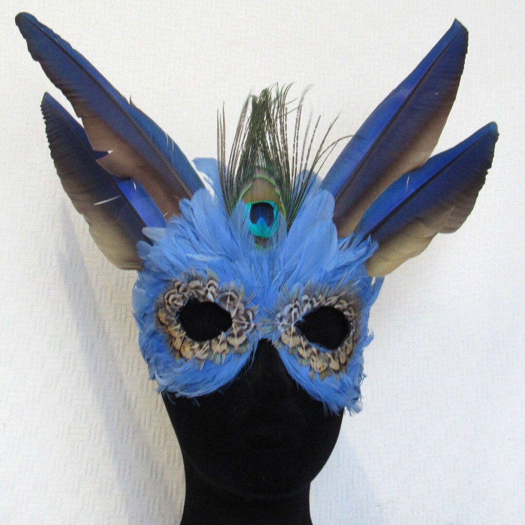 Blue Feather Mask With Macaw Wings and a Peacock Eye is a Colorful Way ...
