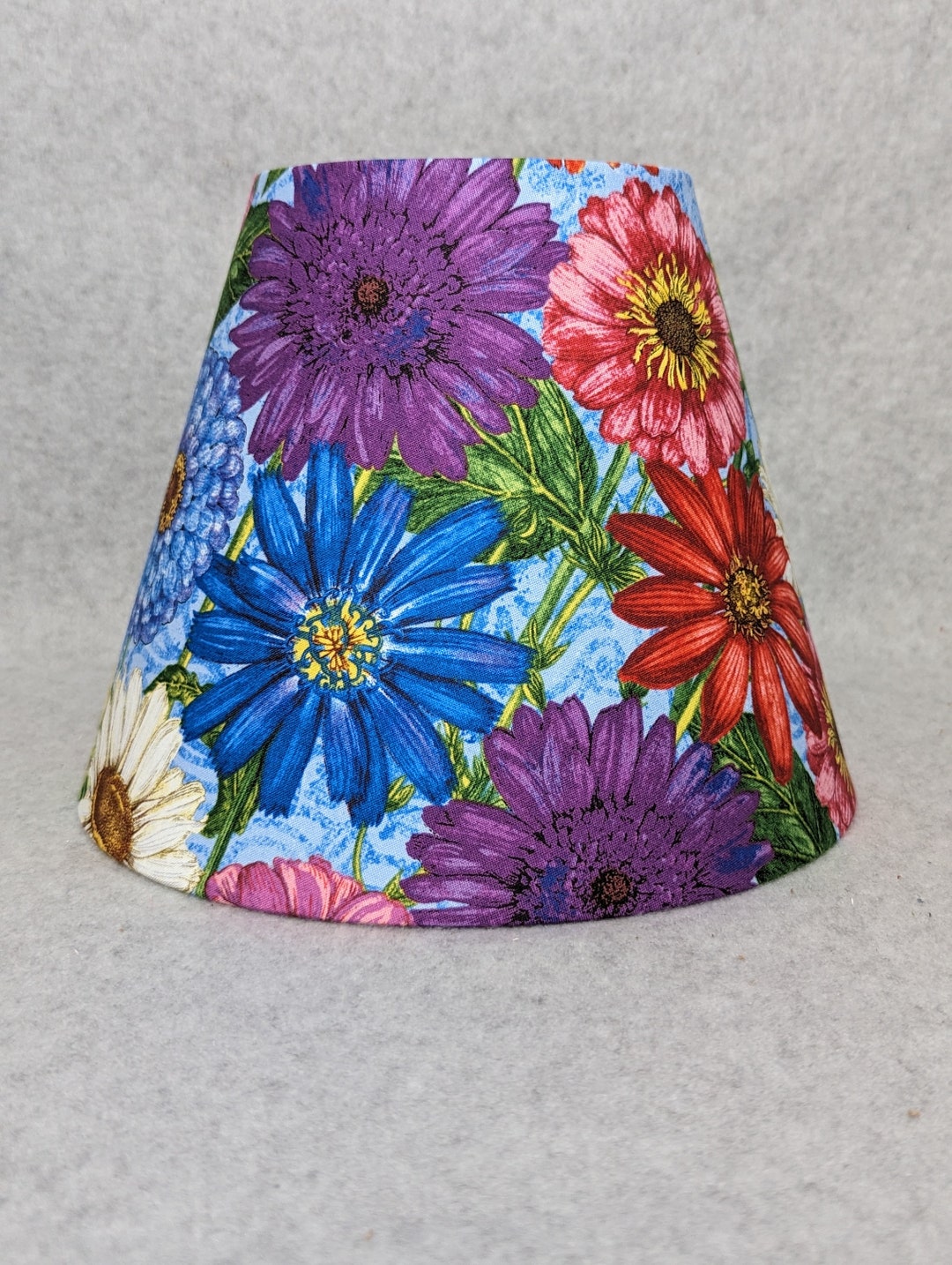 Blooming Flowers Lamp Shade. Blue Background. Bloom. Vibrant. Colorful ...