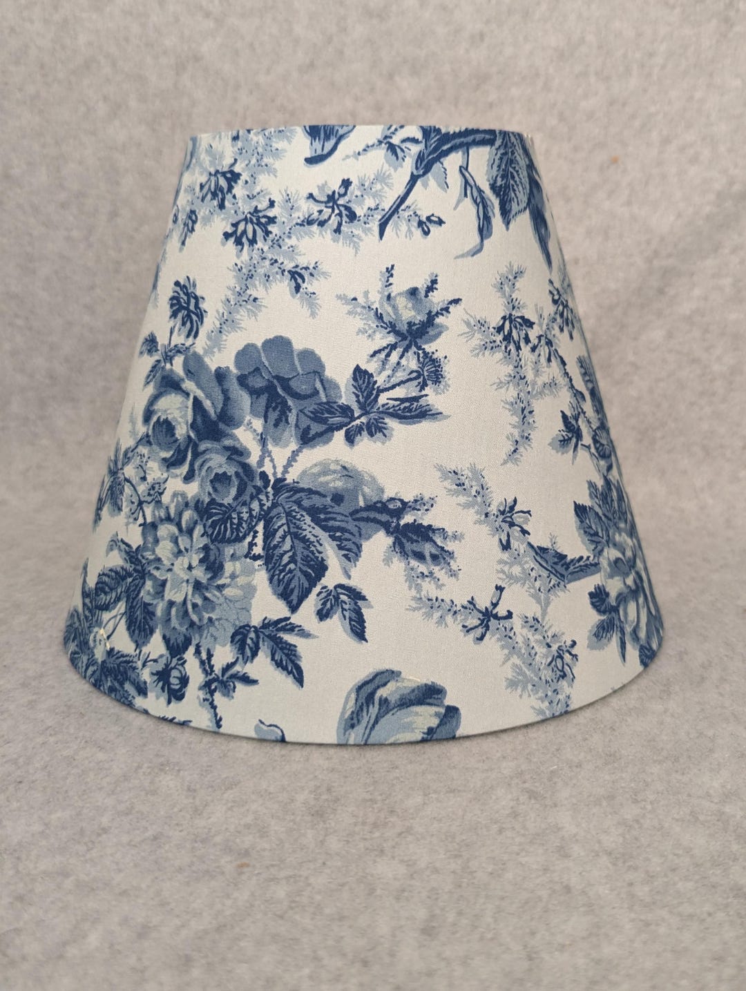 Vintage Look Blue Flowers Lamp Shade. Plants. Light Blue Background ...