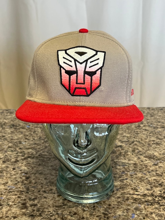 2014 Transformers Autobots Color Shield Snapback Hat … - Gem