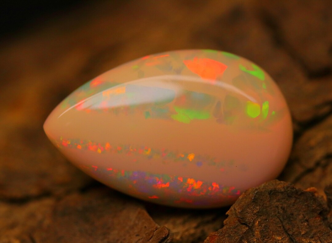 15.1 Ct Banded Ethiopian Opal | Milky Body With Fireplay | 27x17 Mm ...