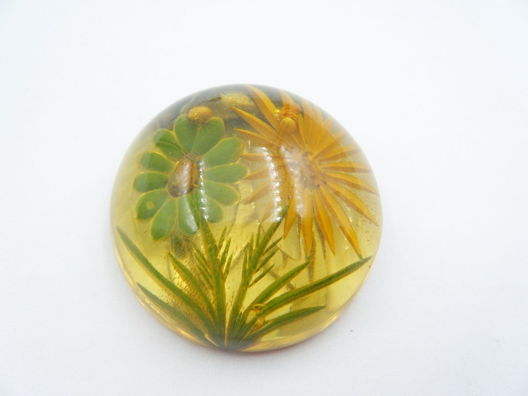 Reverse Carved Flower Bakelite Dome Dress Clip, Apple Juice Bakelite ...