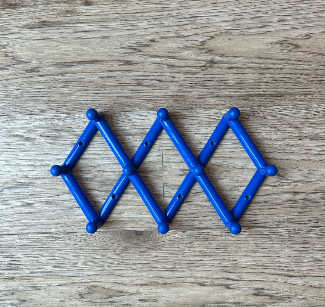 Blue Plastic Accordion Peg Wall Hanging Rack / Jewelry Storage ...