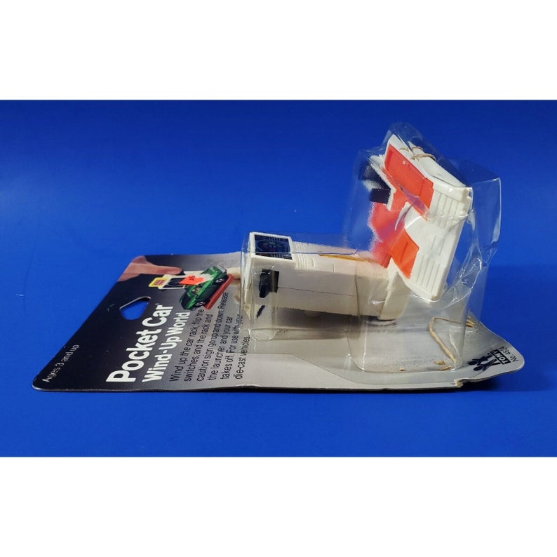 NOS Vintage 1981 TOMY Pocket Car Wind up World Car Rack Mechanic Lift ...