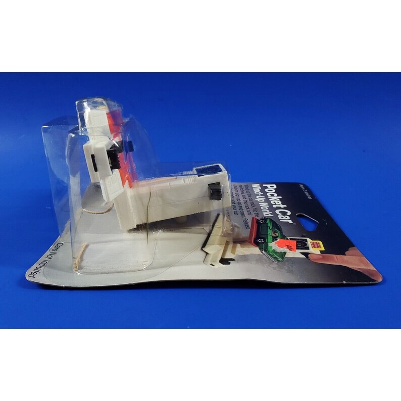 NOS Vintage 1981 TOMY Pocket Car Wind up World Car Rack Mechanic Lift ...