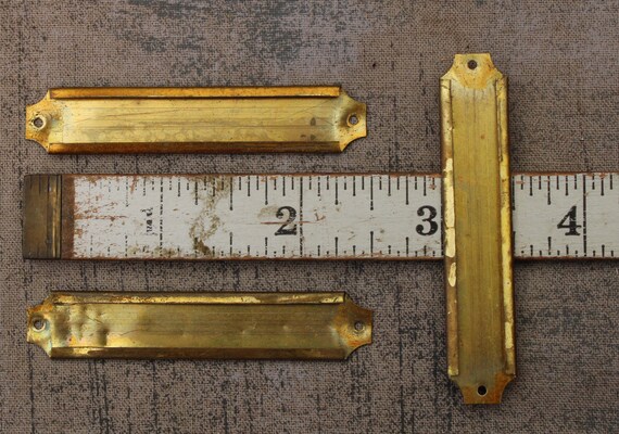 Brass name holder store