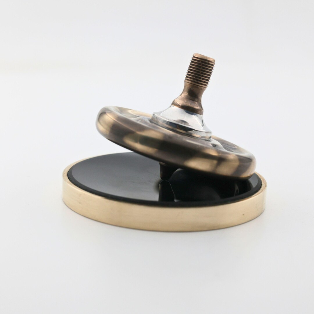 Titanwhirl – 8 Min Spin Time With Long Spinning Top | Precision Gyro ...
