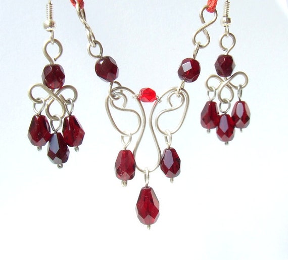 Items similar to Ruby red necklace earrings jewelry silver plated ...