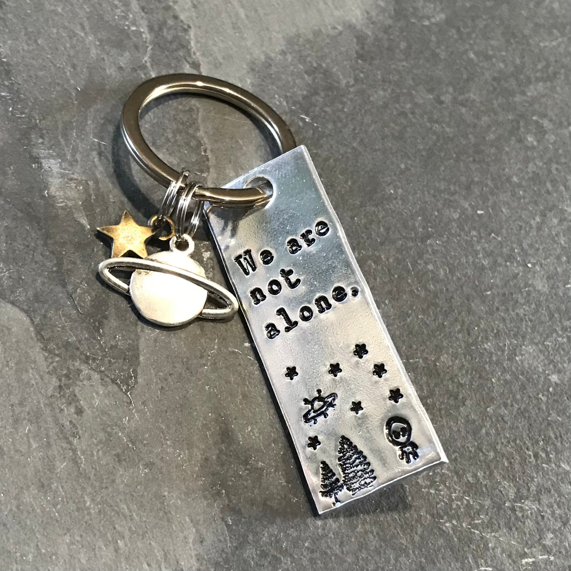 X Files inspired We are not alone keychain | Etsy