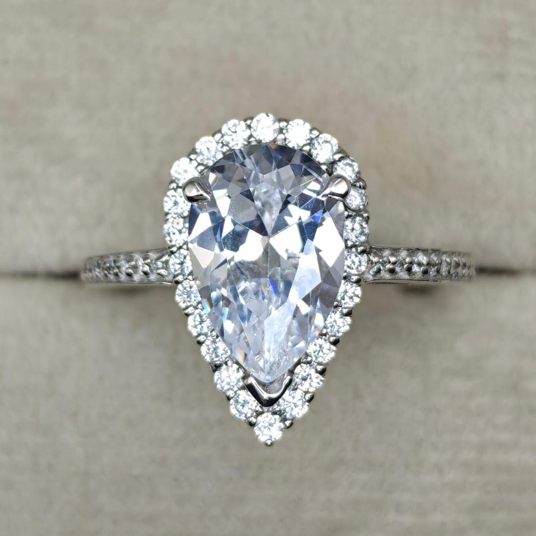 Sparkling Teardrop Halo Ring