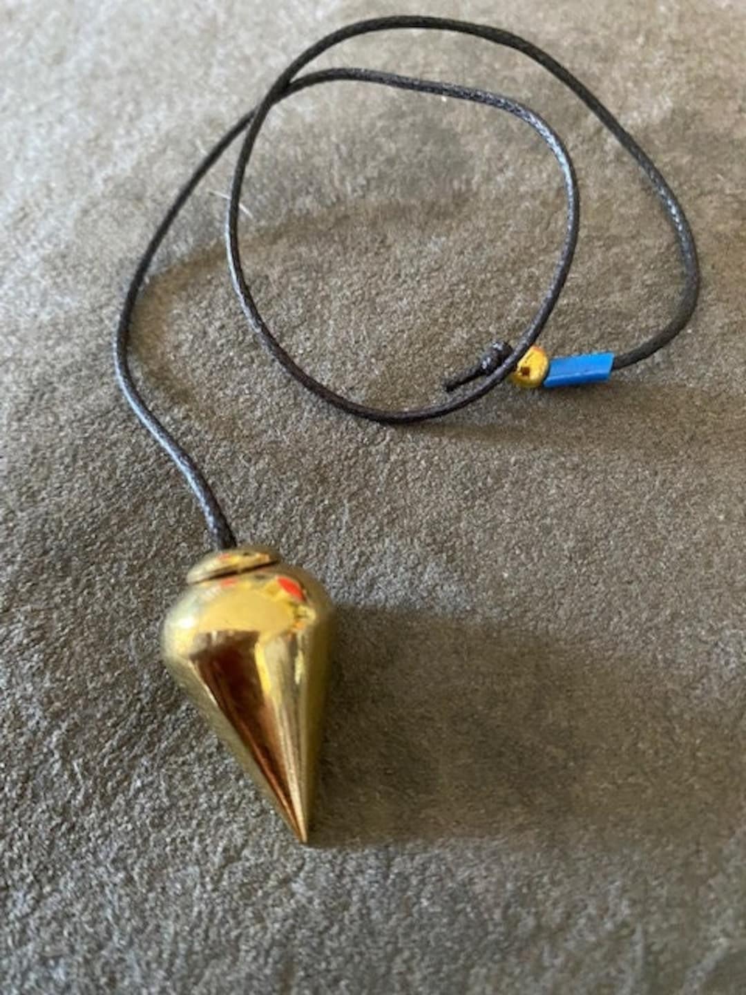 BRASS TEARDROP PENDULUM on Black Cord and Faience Tip - Etsy