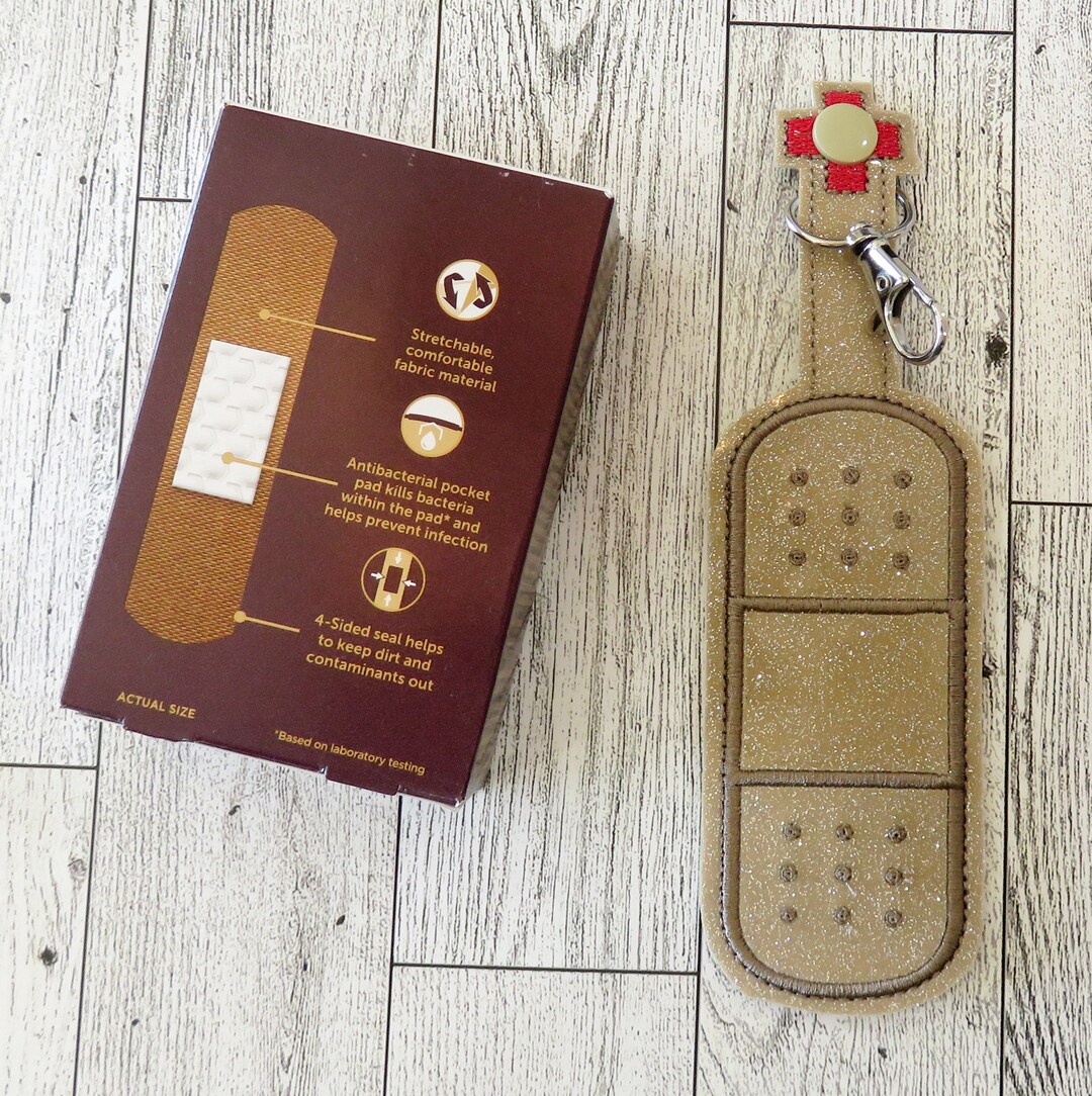 BANDAGE HOLDER or Pouch. Keep Bandages Safely Packed Away. Clip Inside ...