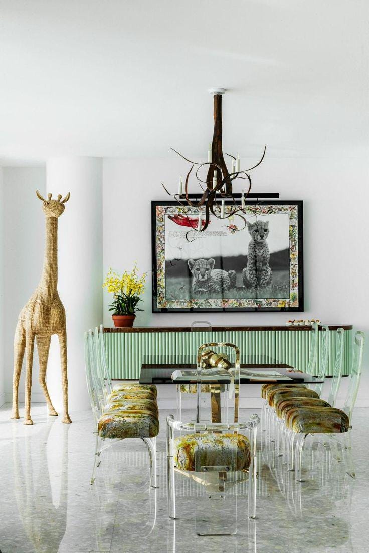 The Image Shows a Chic and Eclectic Dining Room. the Focal Point is a ...