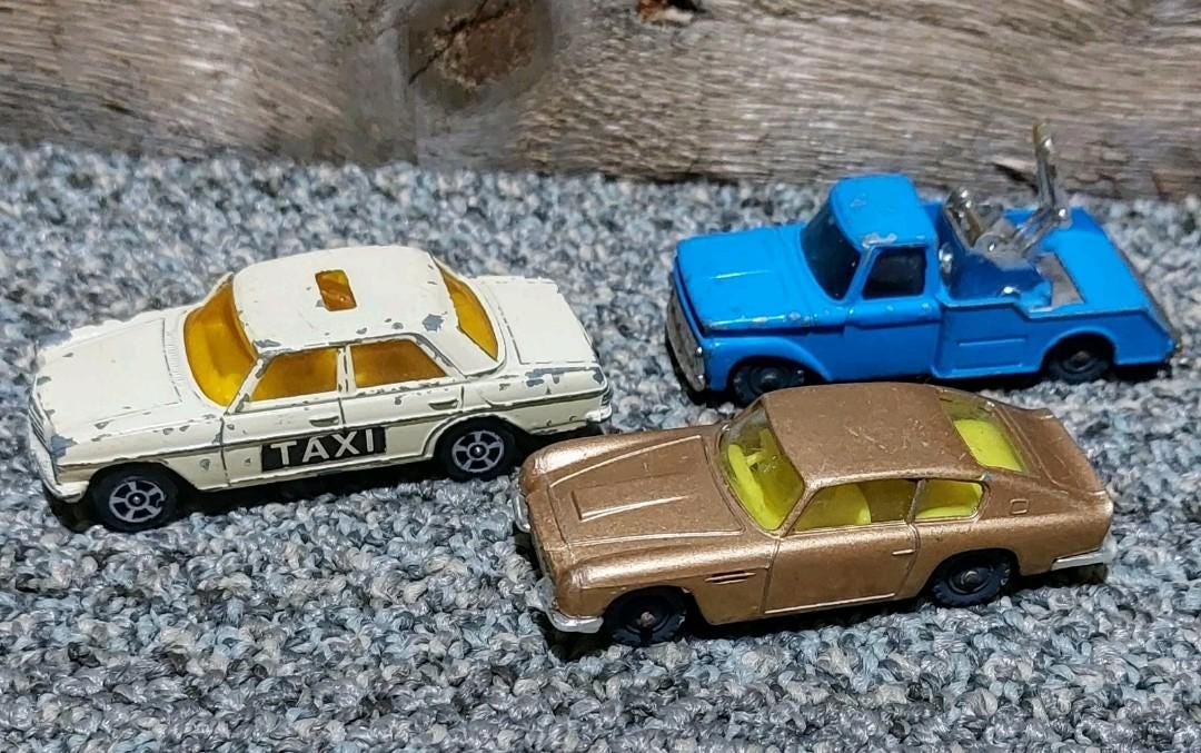 Vintage Diecast Car Set: One Corgi Jr, One Huskey,a Ford,and a Aston ...