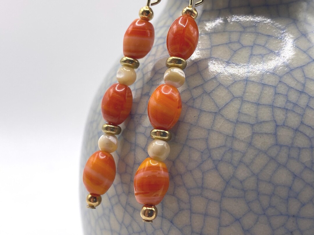 Coraline: Twisted Coral Colored Glass Beads, Mother of Pear, and Gold ...