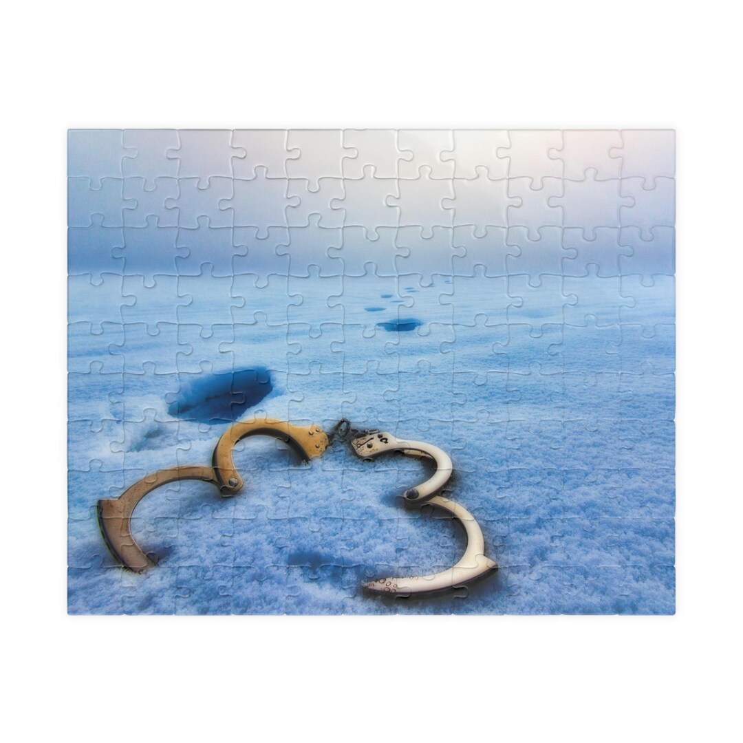 Handcuffs and Footprints in Snow Puzzle | Public Domain Q Illustration ...
