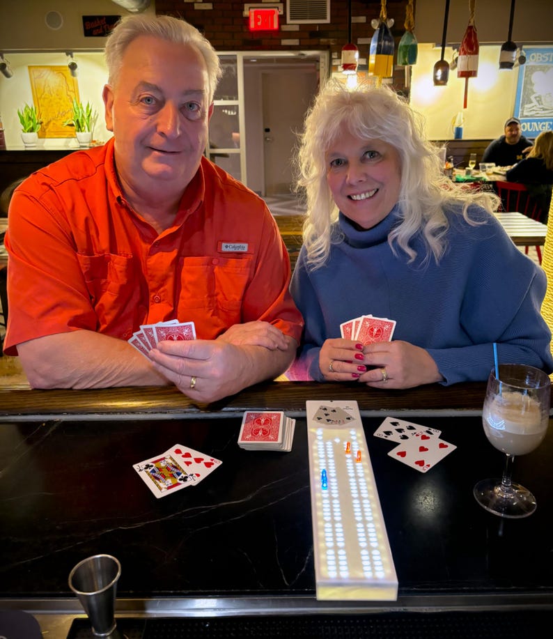 LED Cribbage Board That Uses Light to Illuminate the Colored Pegs and ...