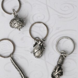 Spine Key Chain - Etsy