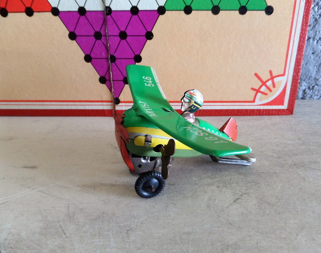 Vintage Tin Toy Wind-up Stunt Rollover Plane Artist J.G. Sch 546 ...