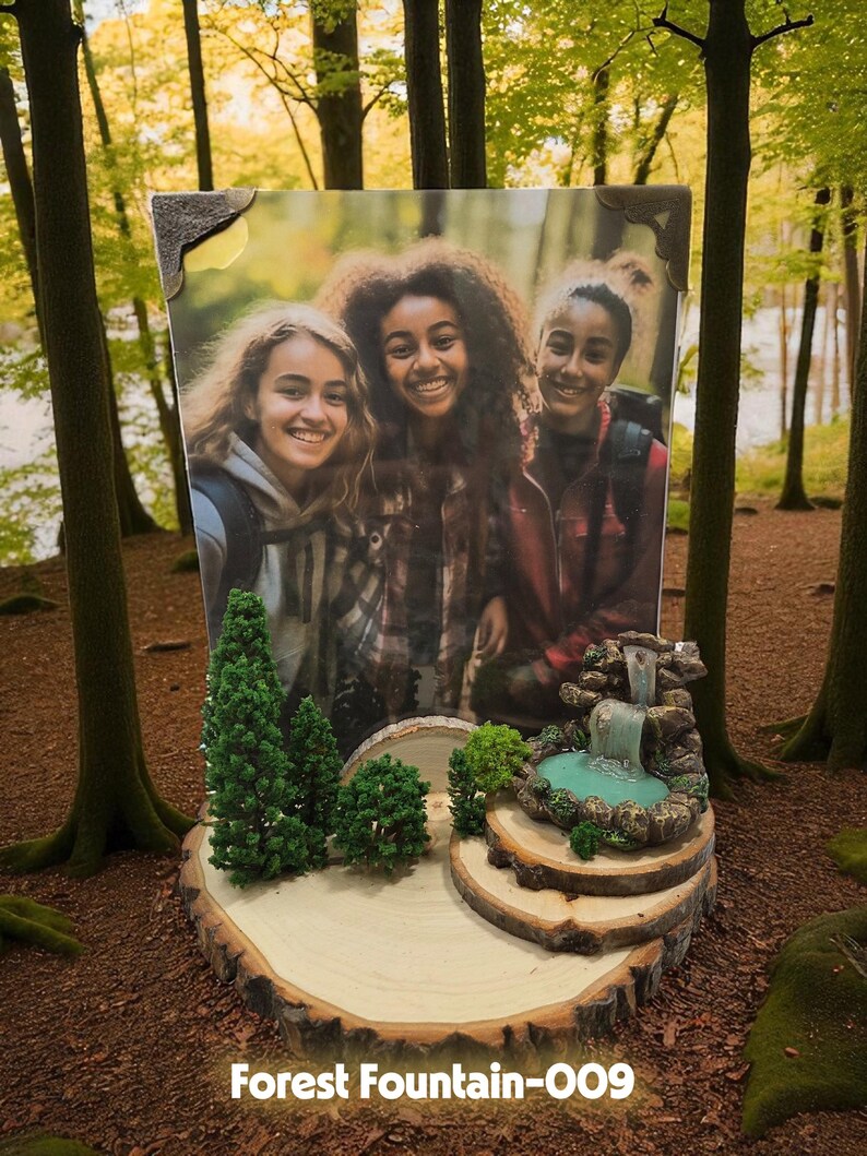 An 8x10 Picture Shows a Vignette of Trees and a Waterfall on a 1"x10 ...