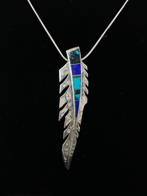 ray tracey knifewing feather - Gem