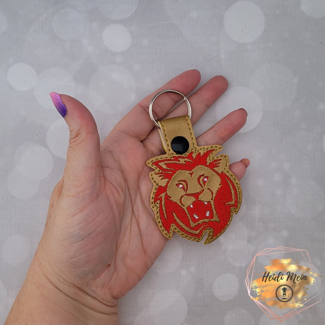 Marine Vinyl Faux Leather Lion Mascot Snap Tab Keychain - Unique and ...