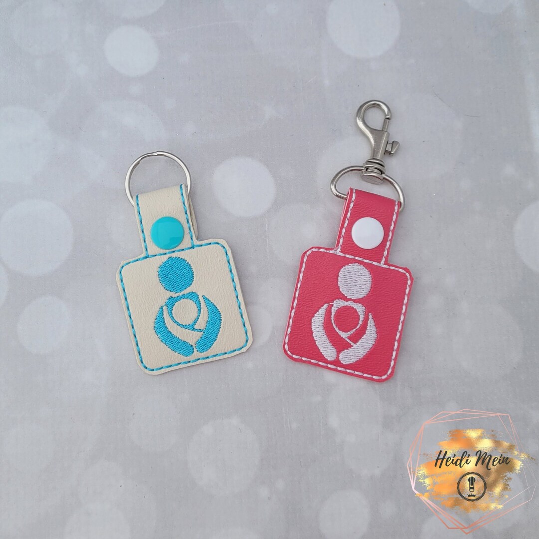 Custom Made Baby Wearing Keychain With Beautiful Marine Vinyl ...